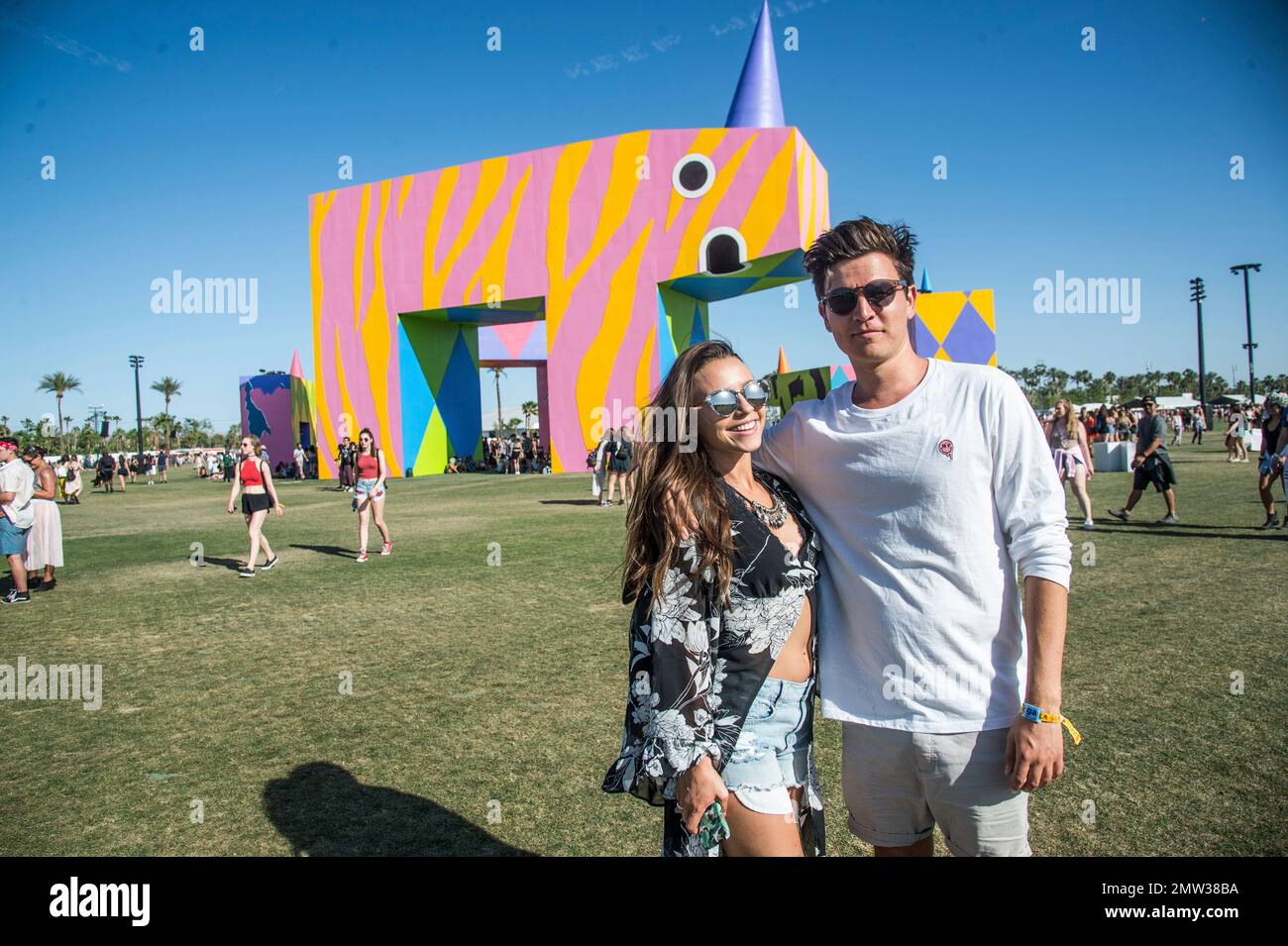 Festival goers Emily Willett, left, and Ben Egan pose at Coachella ...