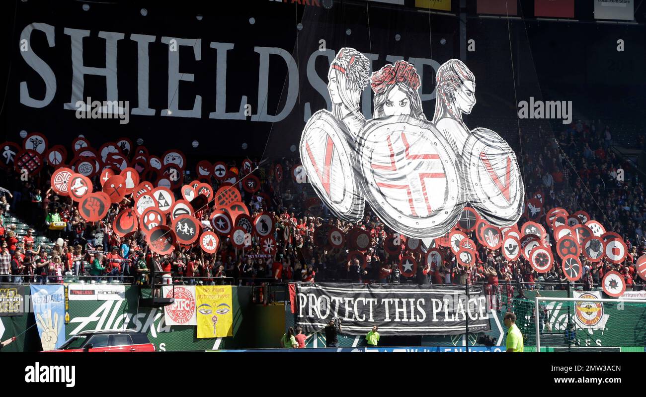 Portland Thorns fans display a large sign and shields before an NWSL ...