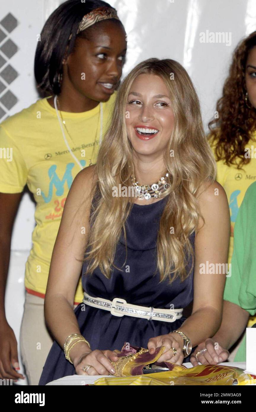 "The City" star Whitney Port and friend, "Brothers & Sisters" actress Roxy Olin, attend the Xtra ...