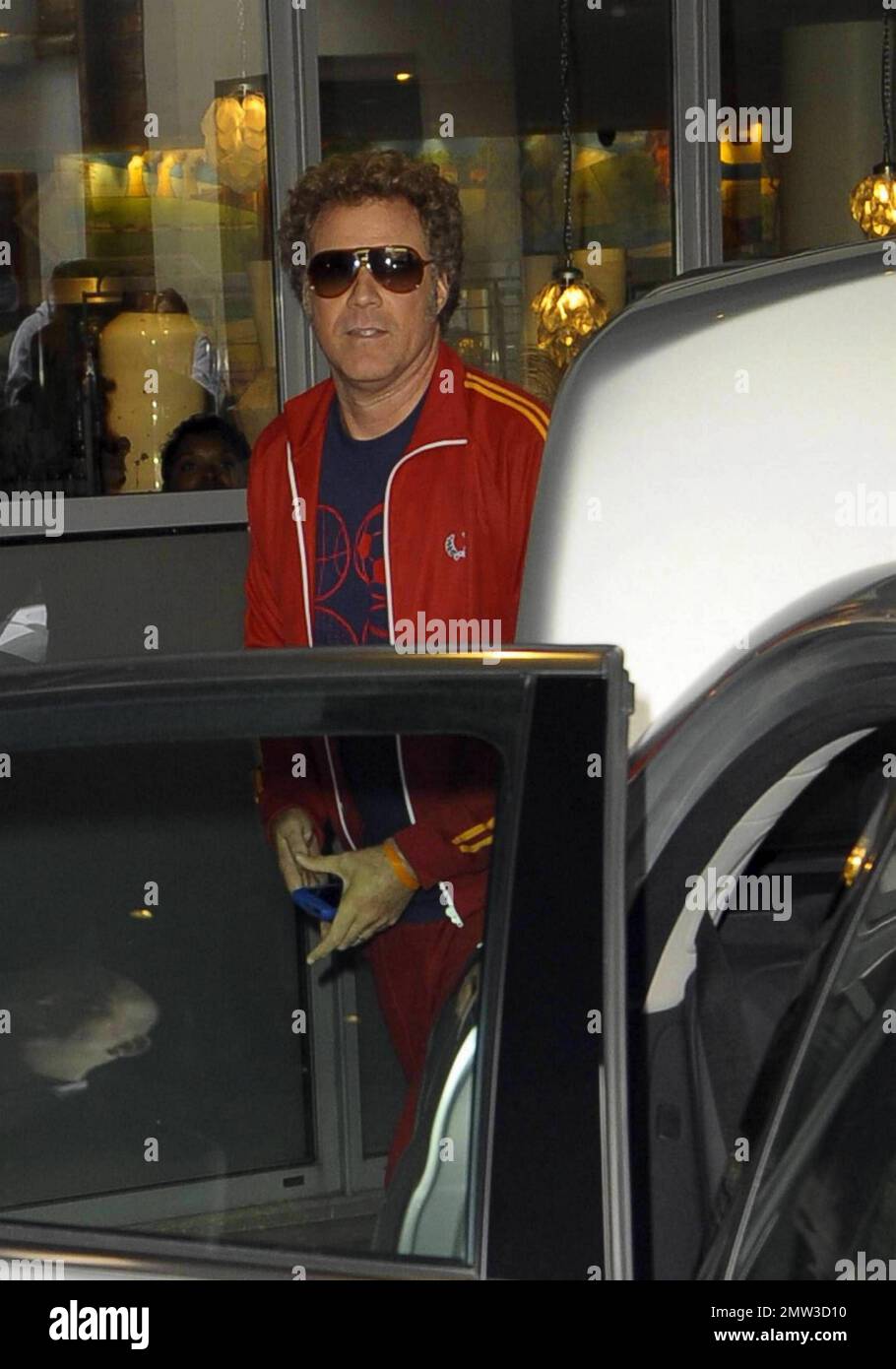 Will Ferrell flashes a thumbs up as he leaves his luxury hotel to head ...