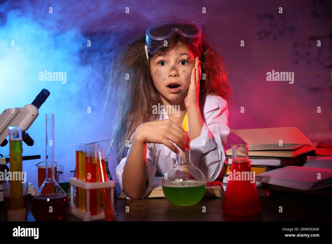 Child doing chemical research in laboratory. Dangerous experiment Stock ...