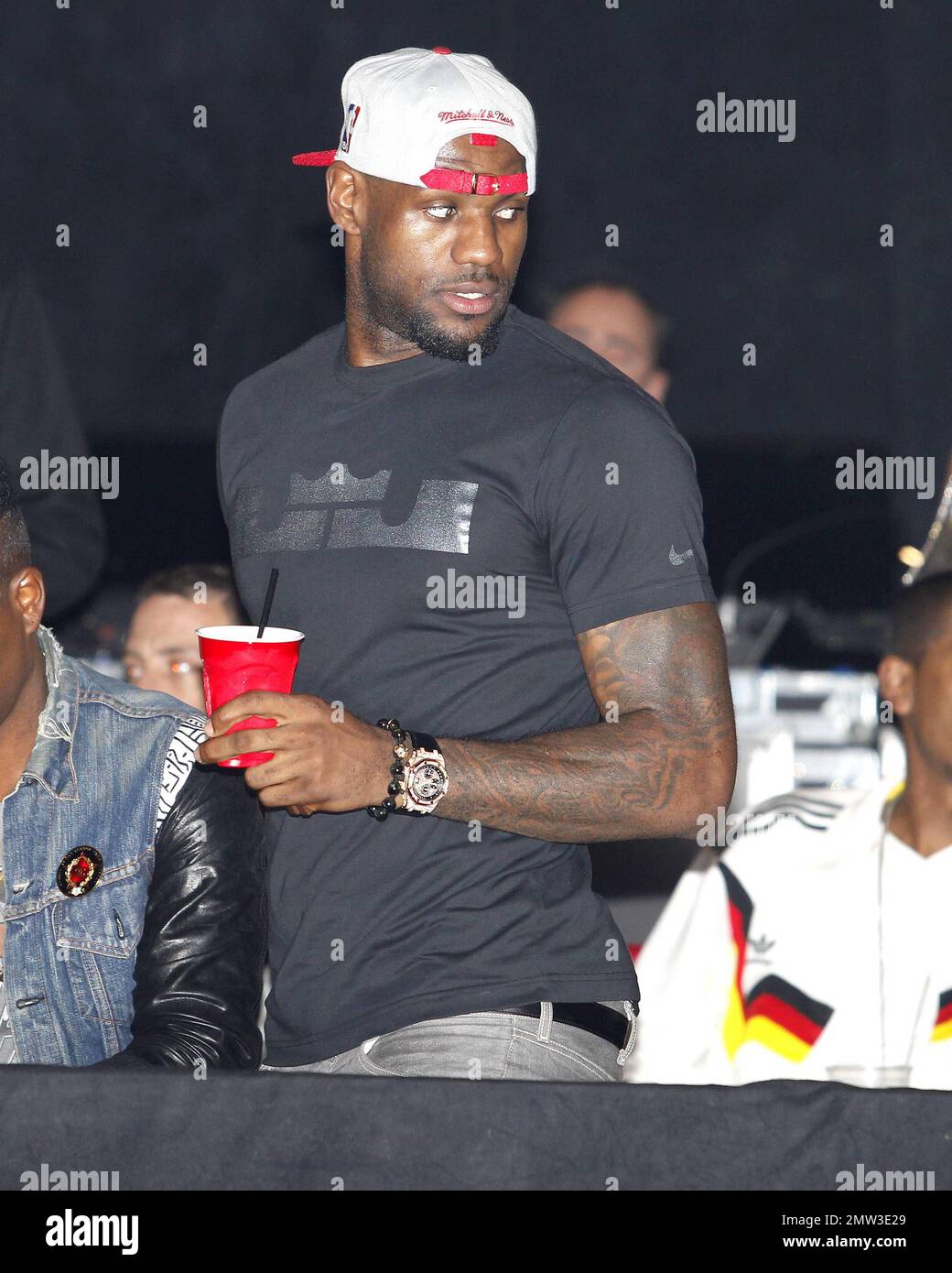 LeBron James waits for the Jay Z and Kanye West concert to begin at the ...