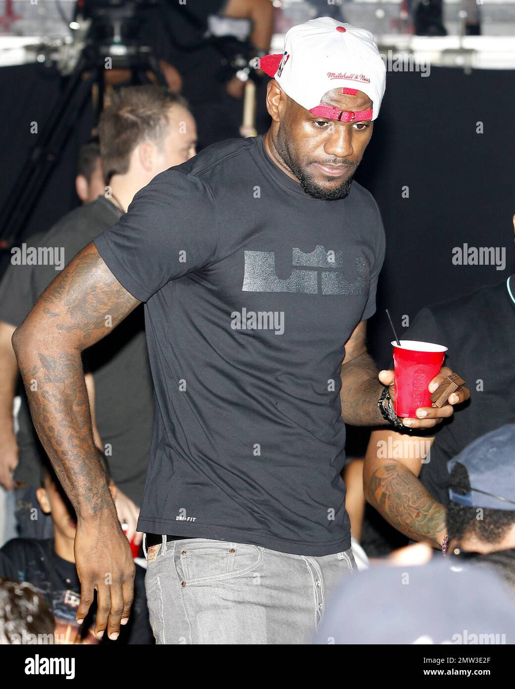 LeBron James waits for the Jay Z and Kanye West concert to begin at the ...