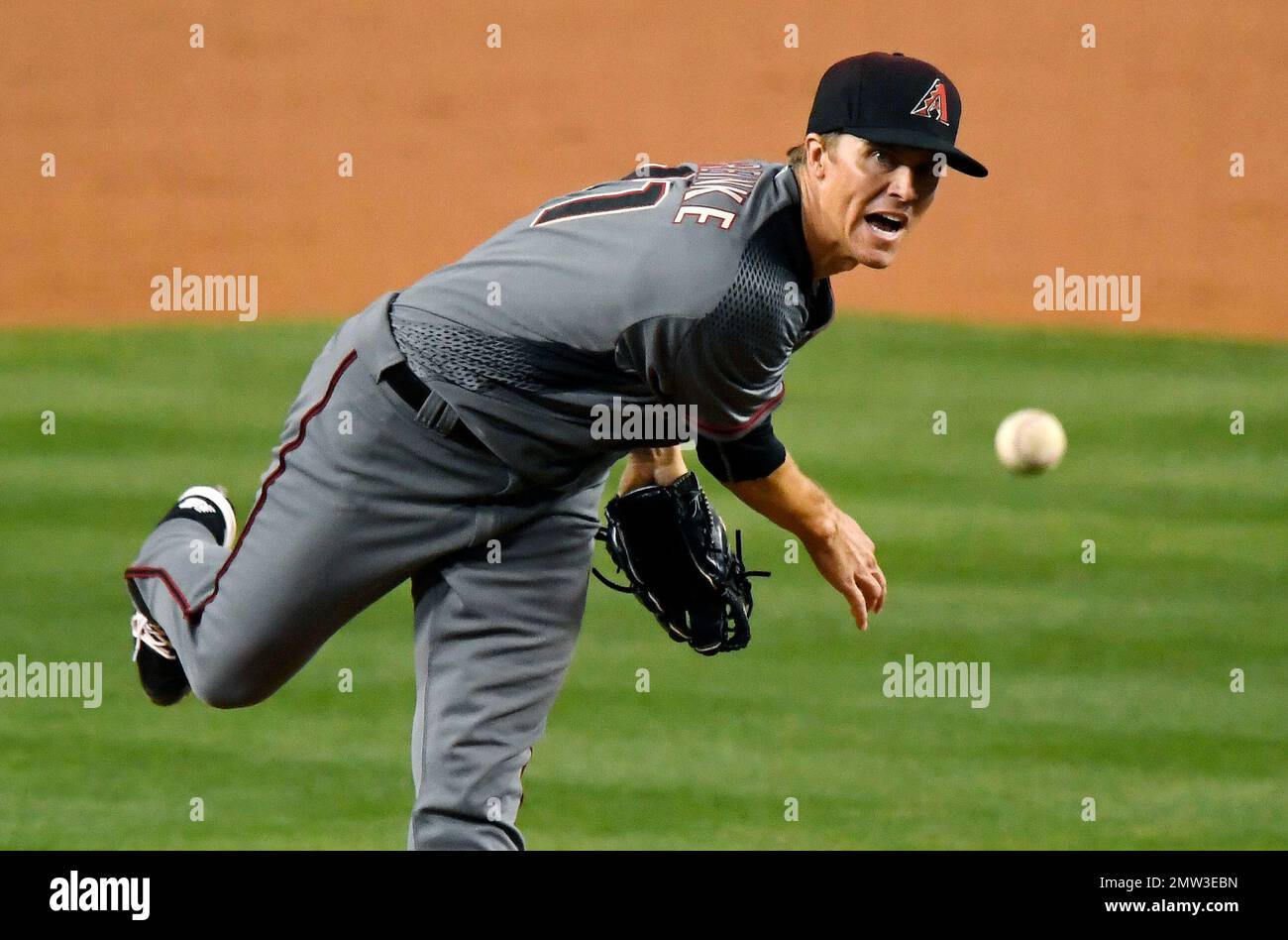 Arizona Diamondbacks starting pitcher Zack Greinke throws to the plate ...