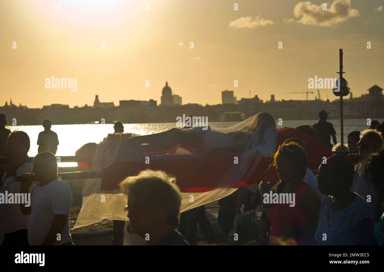 People carry a statue of Jesus Christ during a Holy Week procession on ...