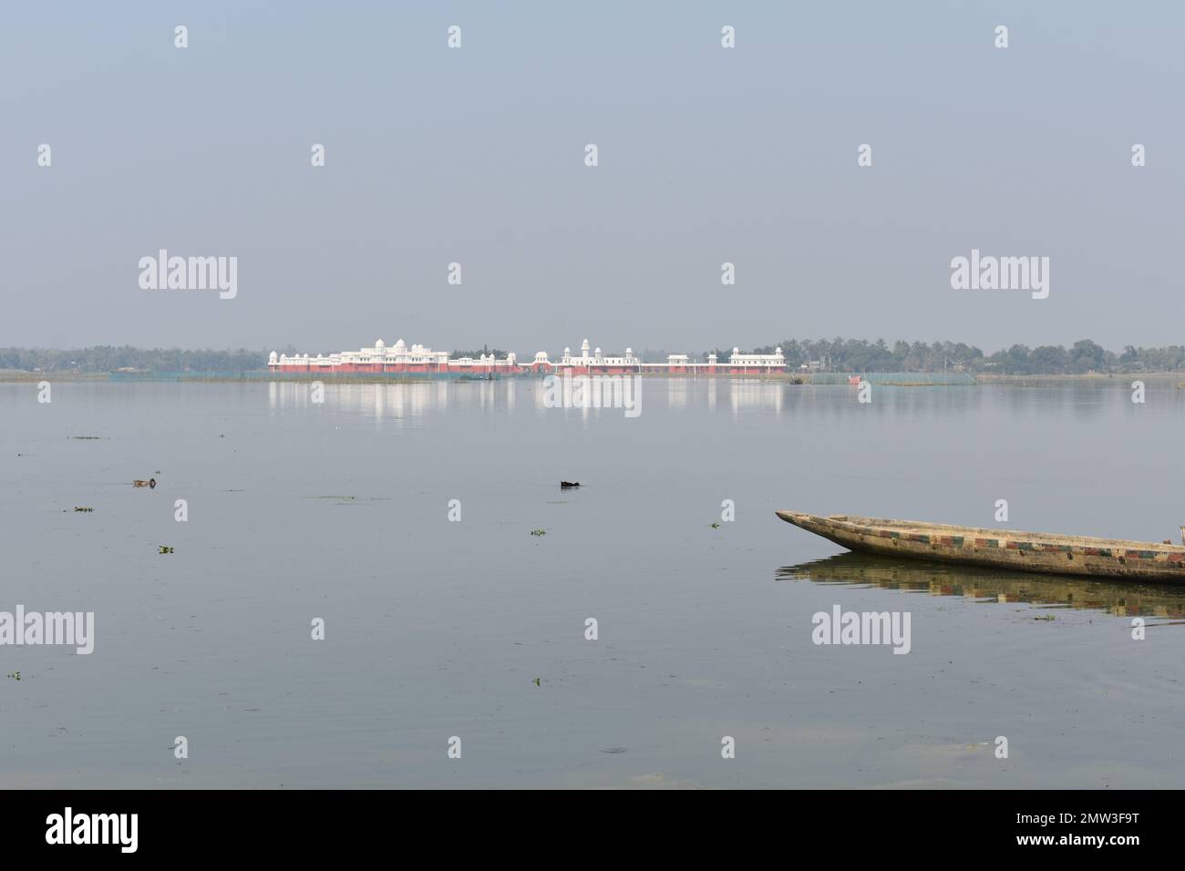 A view of Nirmahal and boats in Rudrasagar lake in Tripura , India ...
