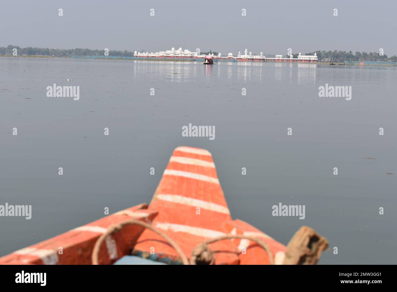 A view of Nirmahal and boats in Rudrasagar lake in Tripura , India ...