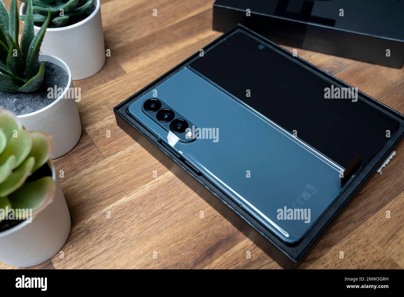 Brand new Samsung Galaxy Z Fold 4 in grey-green color. The device is in ...