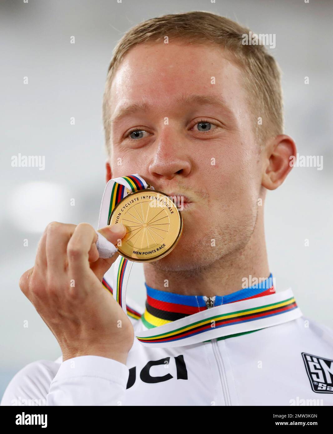 Australia's Cameron Meyer celebrates on the podium after winning the ...