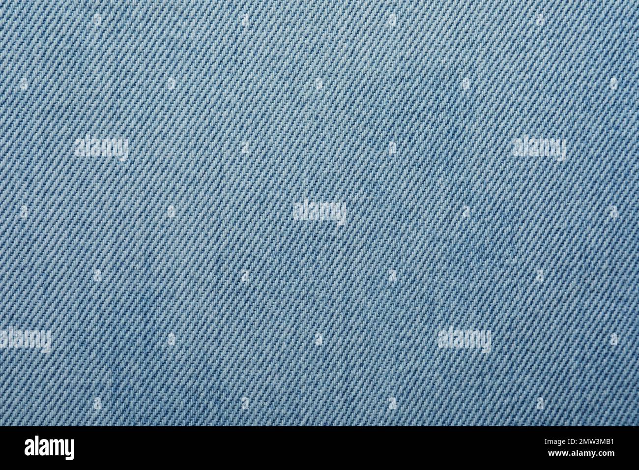 Texture of light blue jeans as background, closeup Stock Photo - Alamy