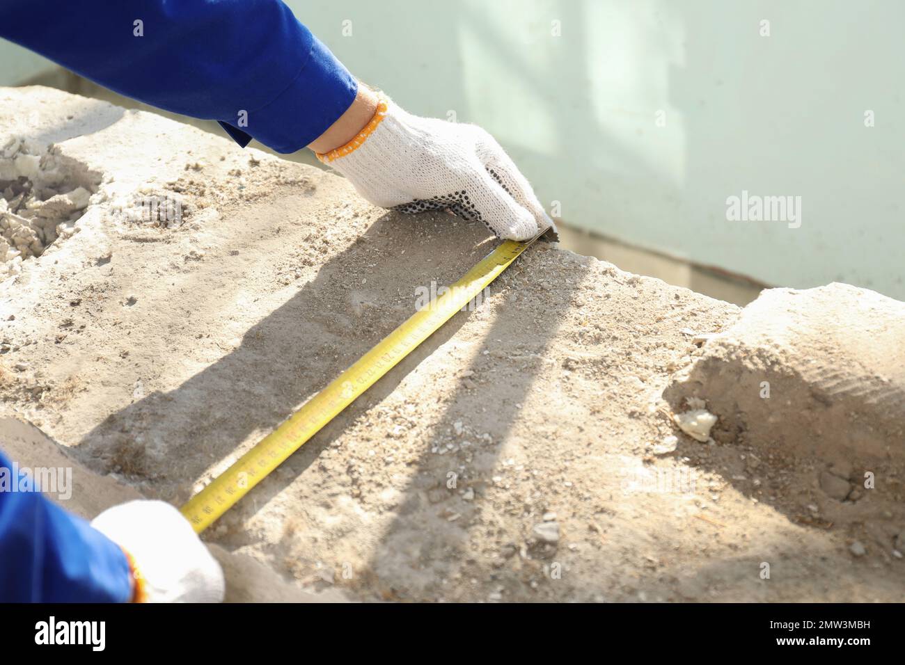 Carpenter hands taking measurement hi-res stock photography and images ...