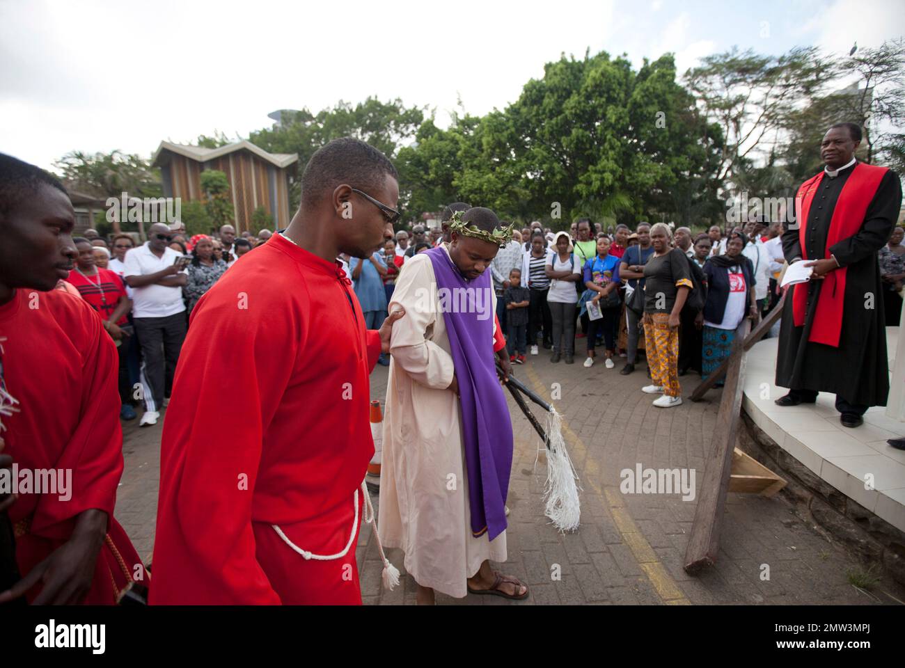 A priest of Catholic Church in Kenya watches local actors re-enact the ...
