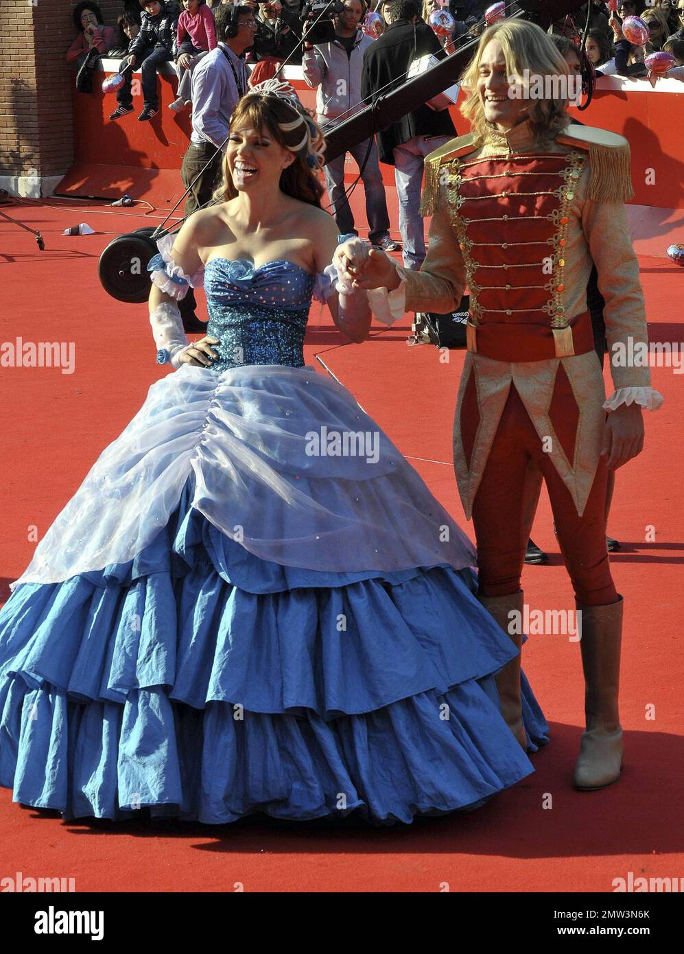 Cast walk the red carpet at the "Winx Club 3D" premiere at the Rome ...