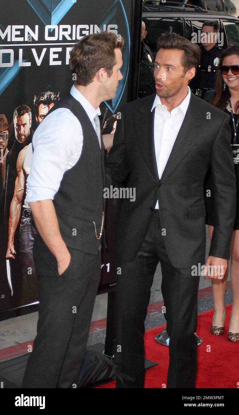 Hugh Jackman and Ryan Reynold play around at the film premiere of 20th ...