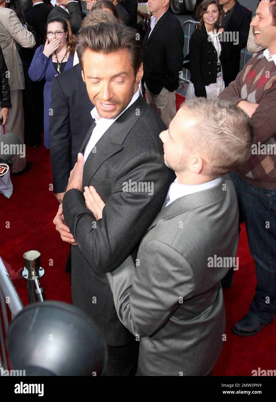 Hugh Jackman and Dominic Monaghan play around at the film premiere of ...