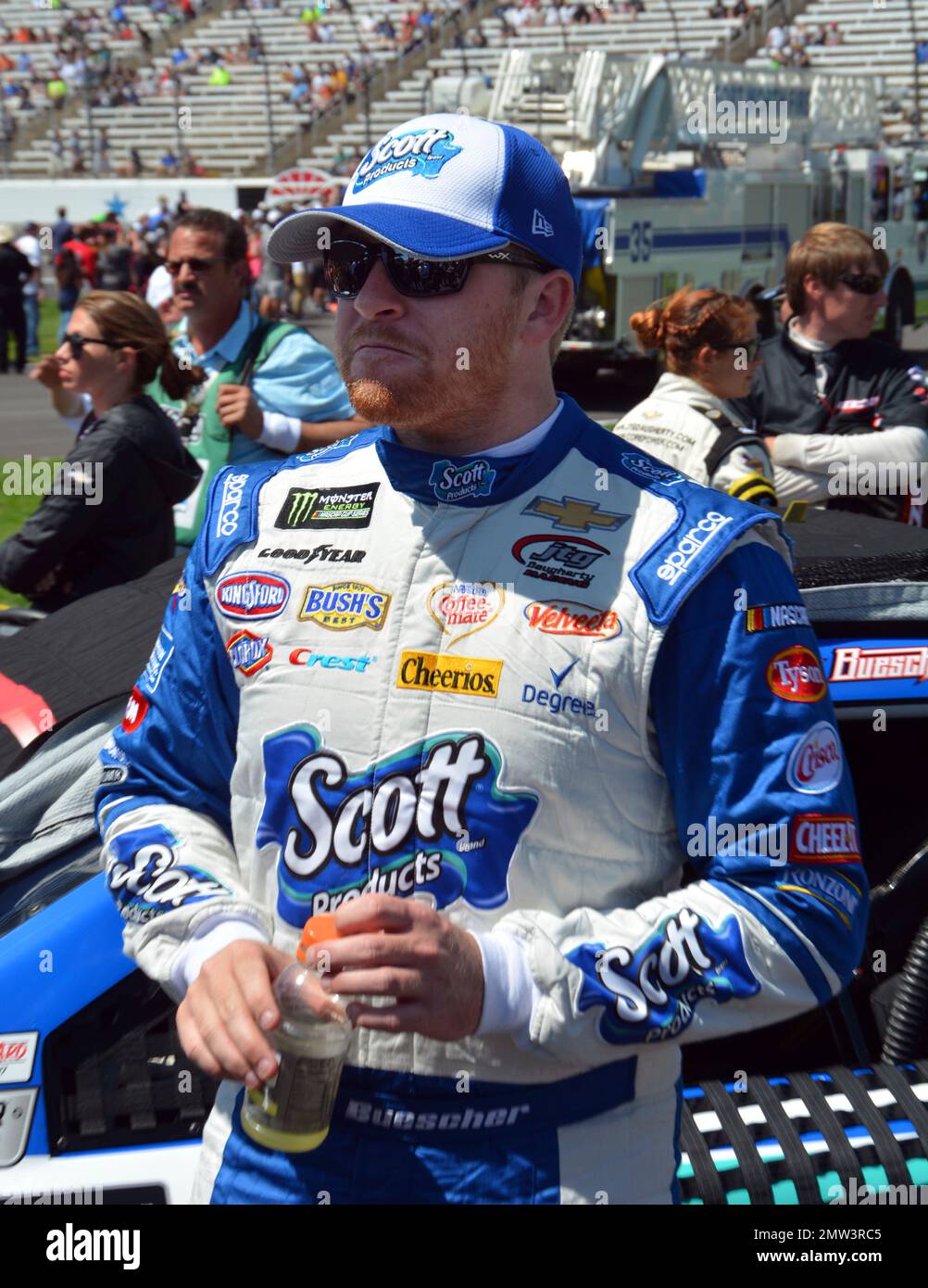 Chris Buescher stands by his car on pit road before the start of the ...