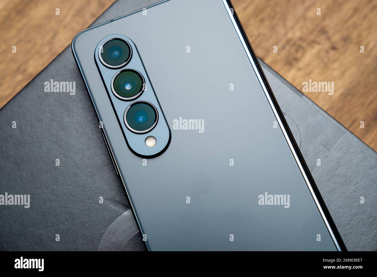 Brand new Samsung Galaxy Z Fold 4 in grey-green color. The device is in ...