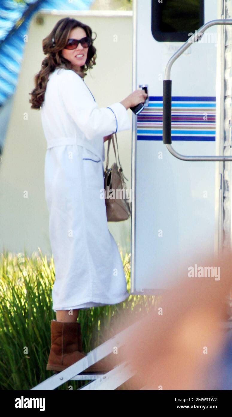 EXCLUSIVE!! In a robe and Ugg boots Elizabeth Hurley arrives at and ...