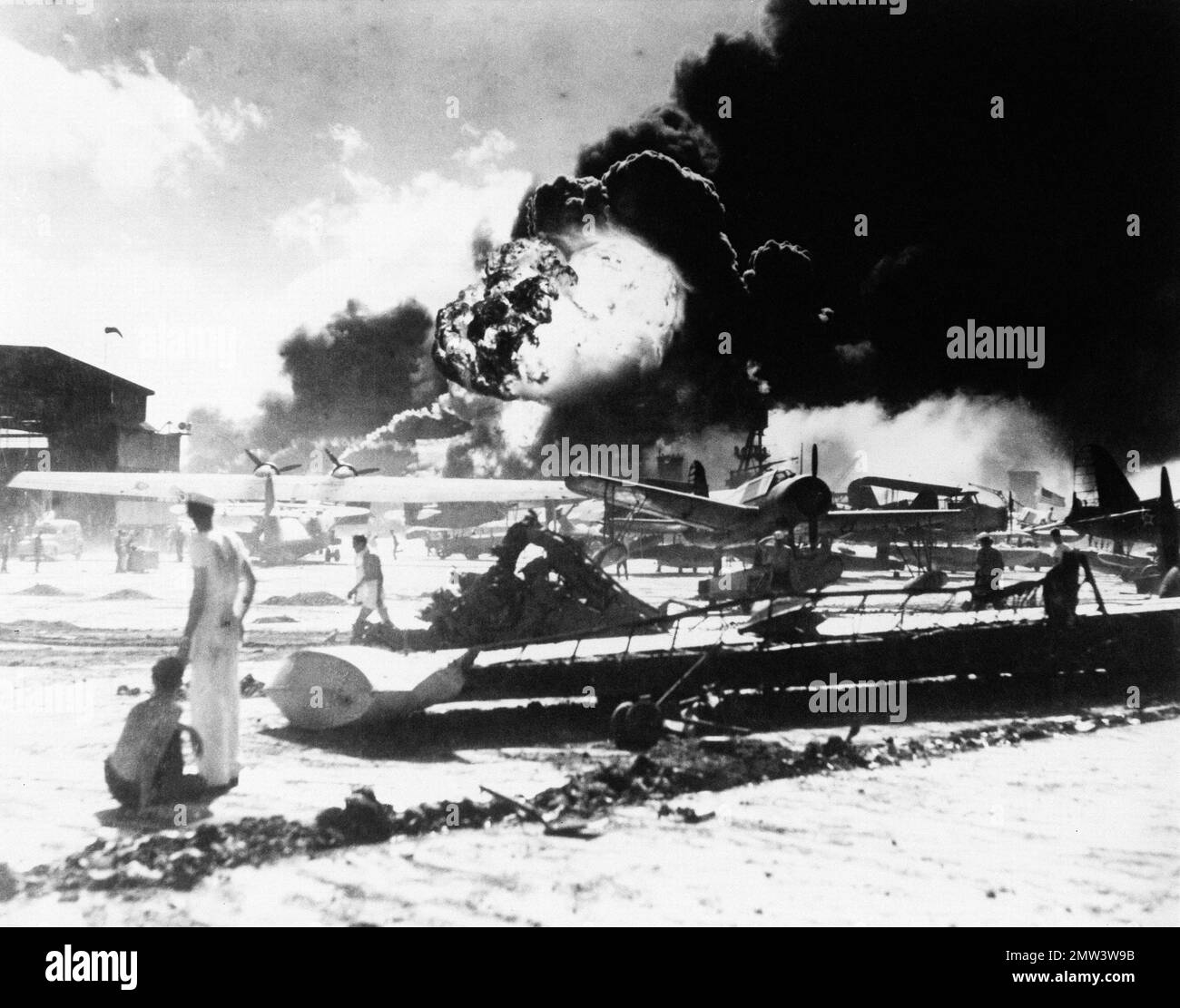 In this photo provided by the U.S. Navy, damage to seaplanes near ...