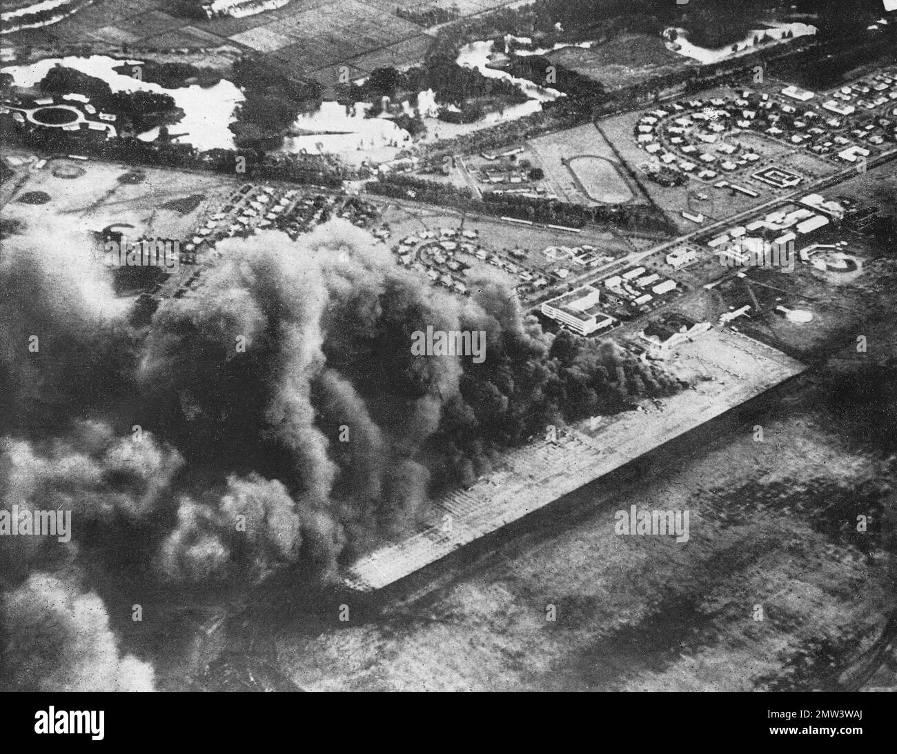 Burning hangars at Hickam Field near Honolulu during the surprise ...