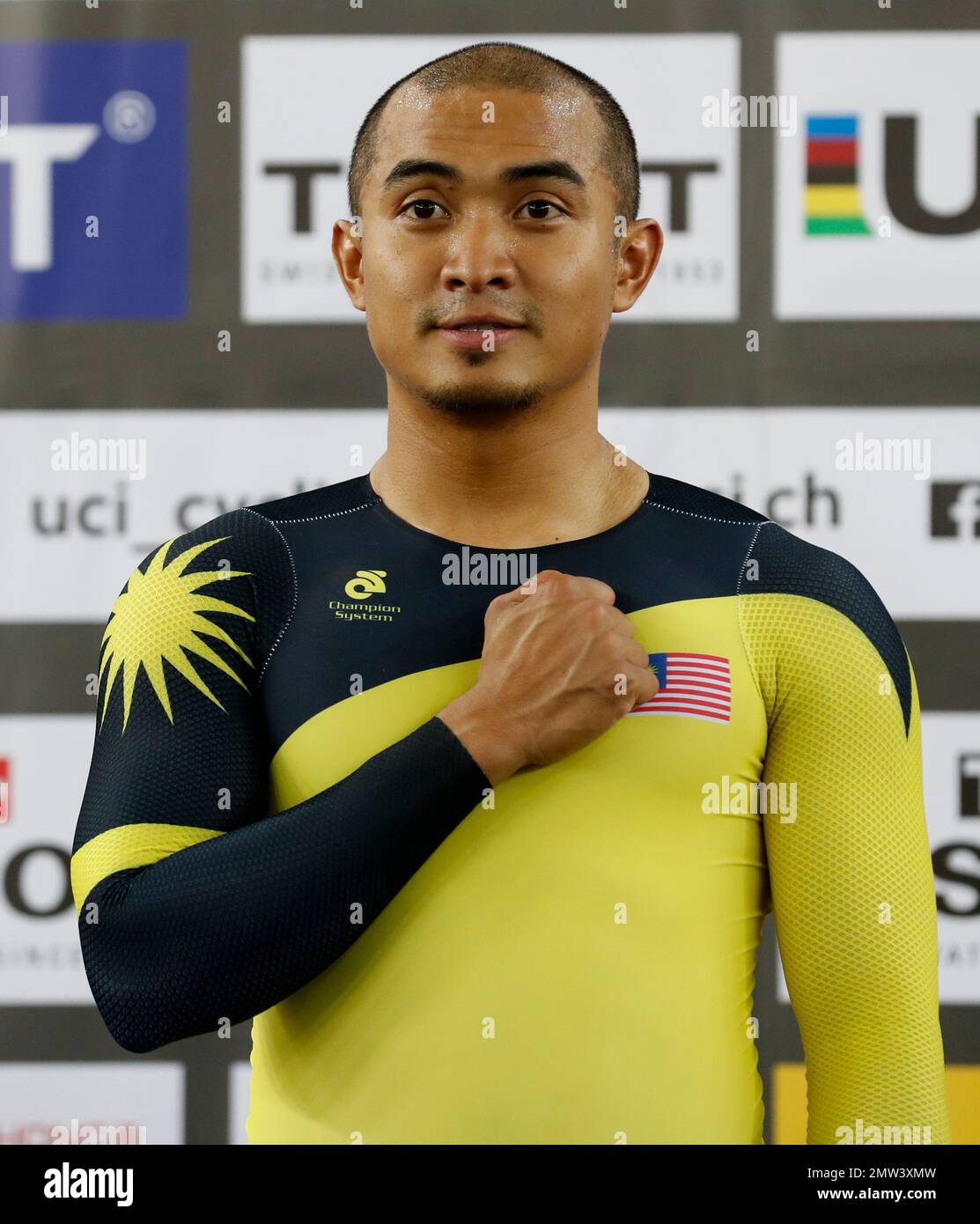 Malaysia's Azizulhasni Awang celebrates on the podium after winning the ...
