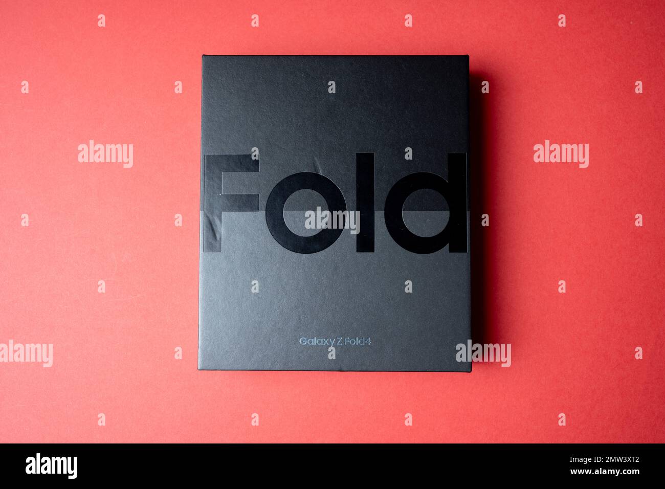 Samsung Galaxy Z Fold 4 in original box. Against a red background Stock ...