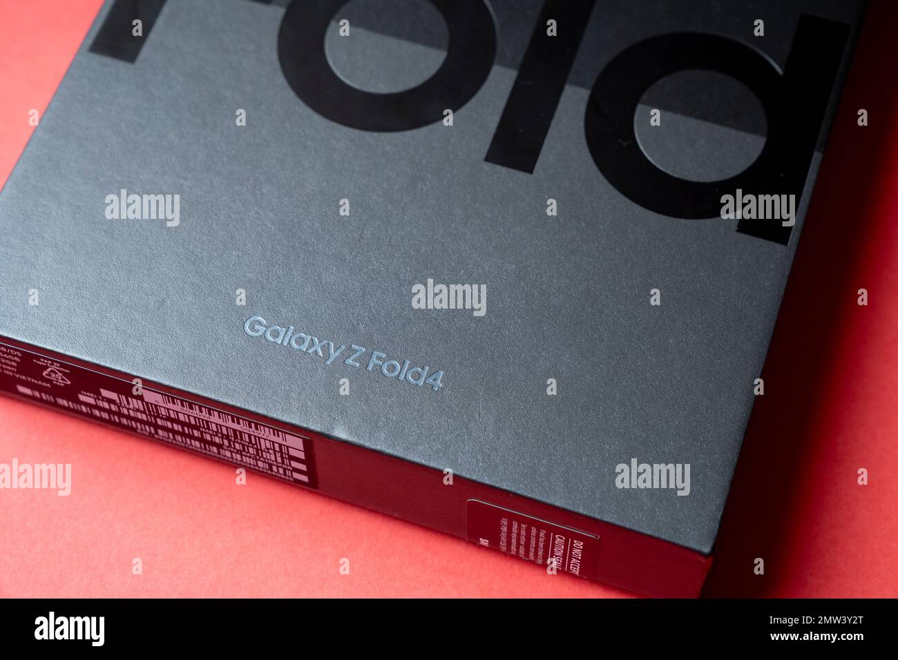 Samsung Galaxy Z Fold 4 in original box. Against a red background Stock ...