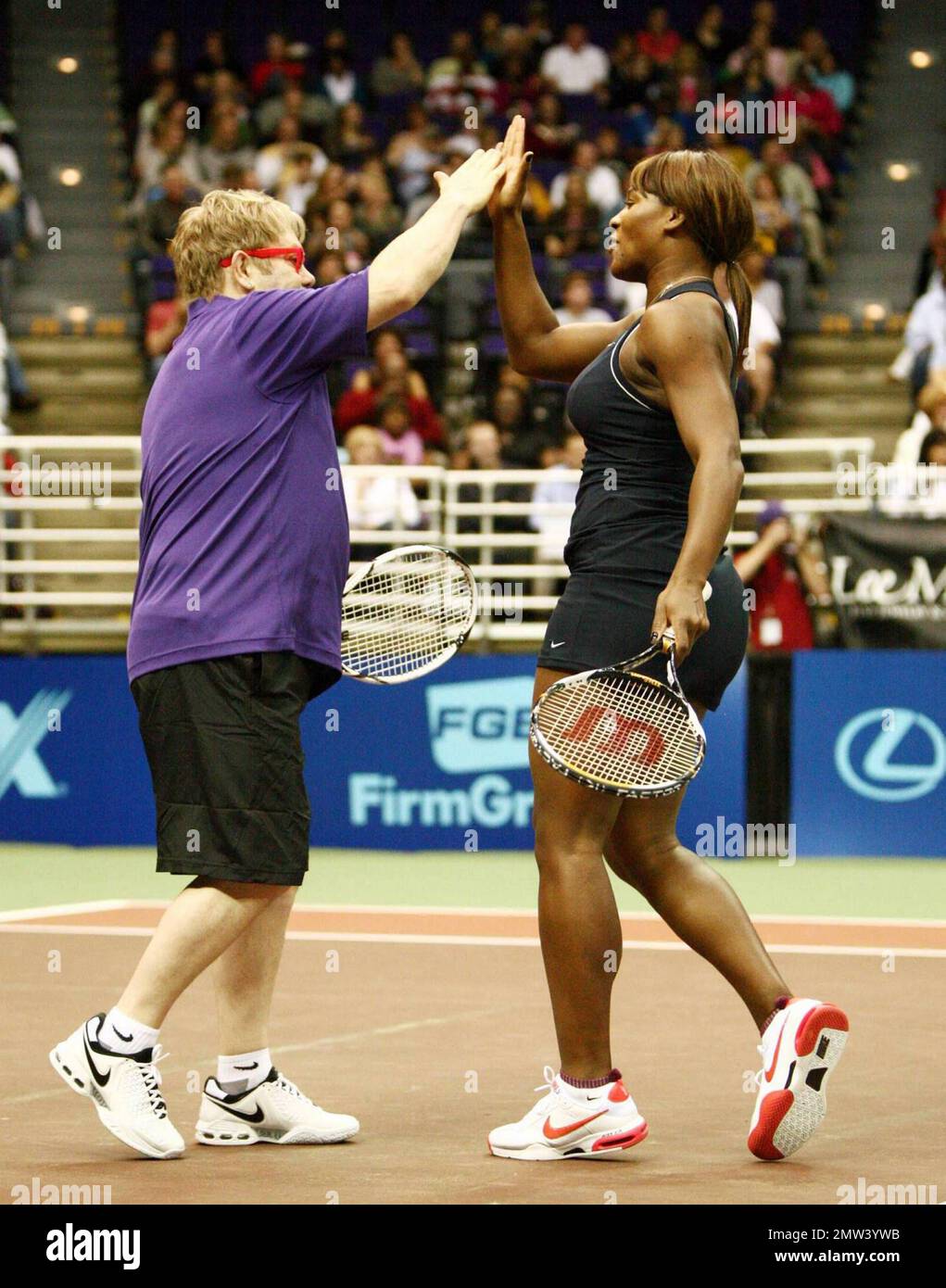 Elton John competes on the court at the Advanta World TeamTennis (WTT ...