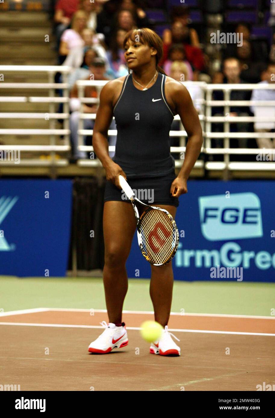 Serena Williams competes on the court at the Advanta World TeamTennis ...