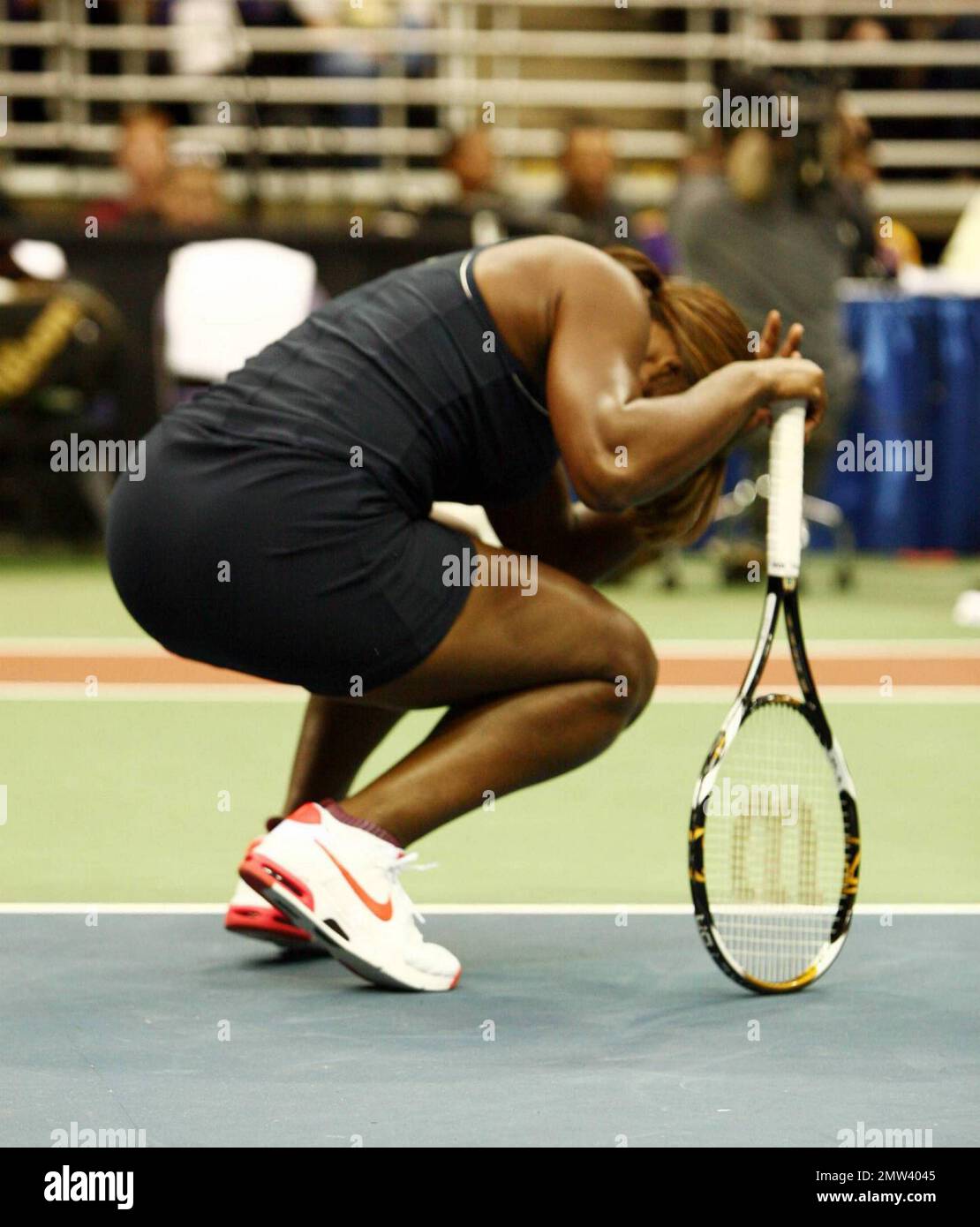 Serena Williams competes on the court at the Advanta World TeamTennis ...