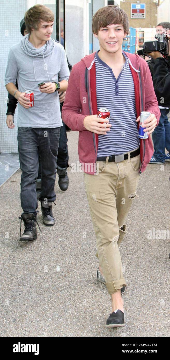 Louis Tomlinson (L) and Liam Payne, members of the "X Factor" finalist ...