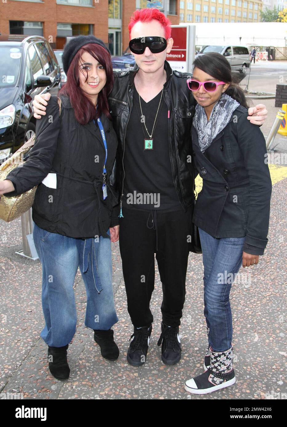 "X Factor" finalist Storm Lee poses with fans as he leaves ITV studios ...