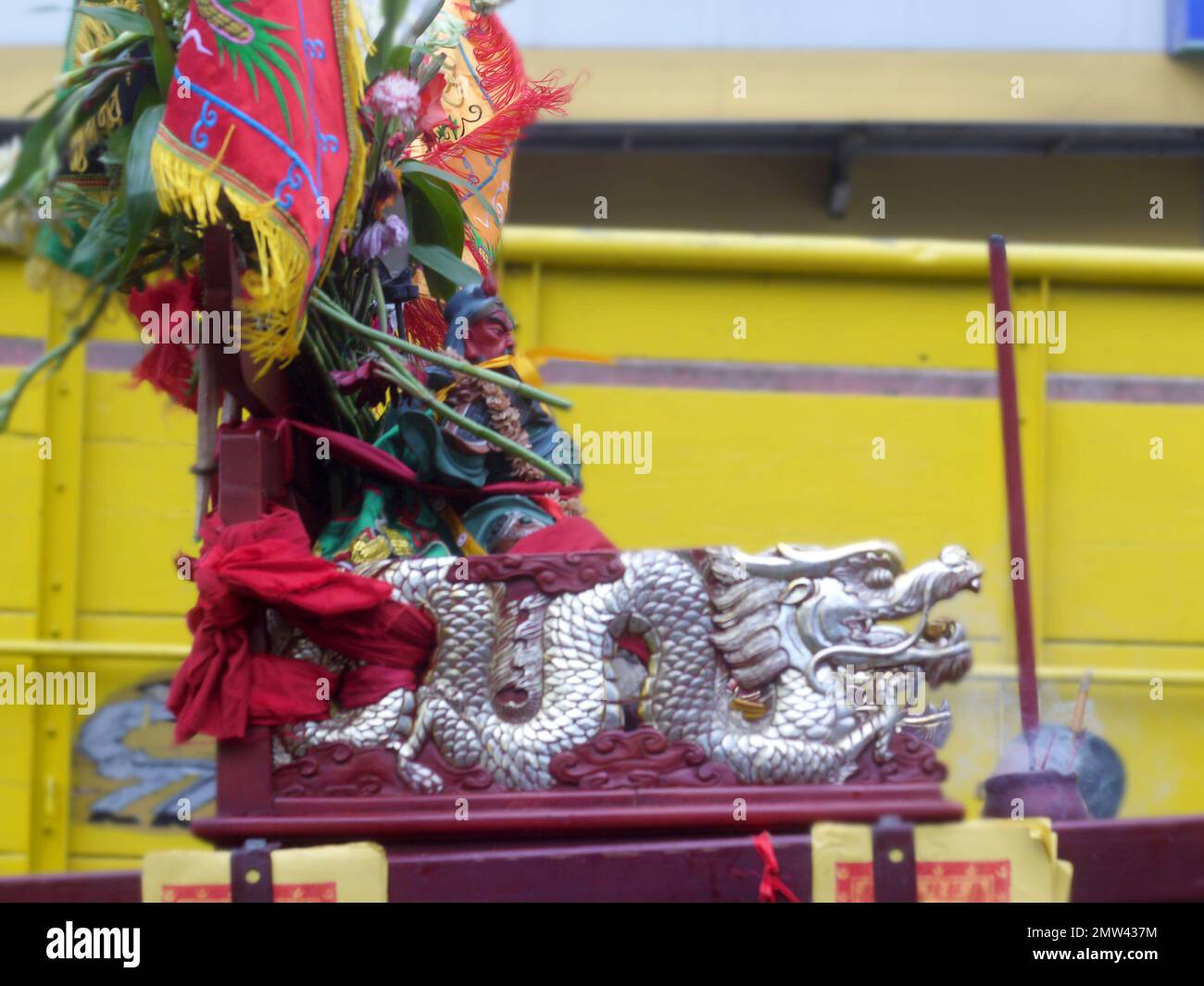 a parade carrying statues of Chinese gods during the Cap Go Meh ...