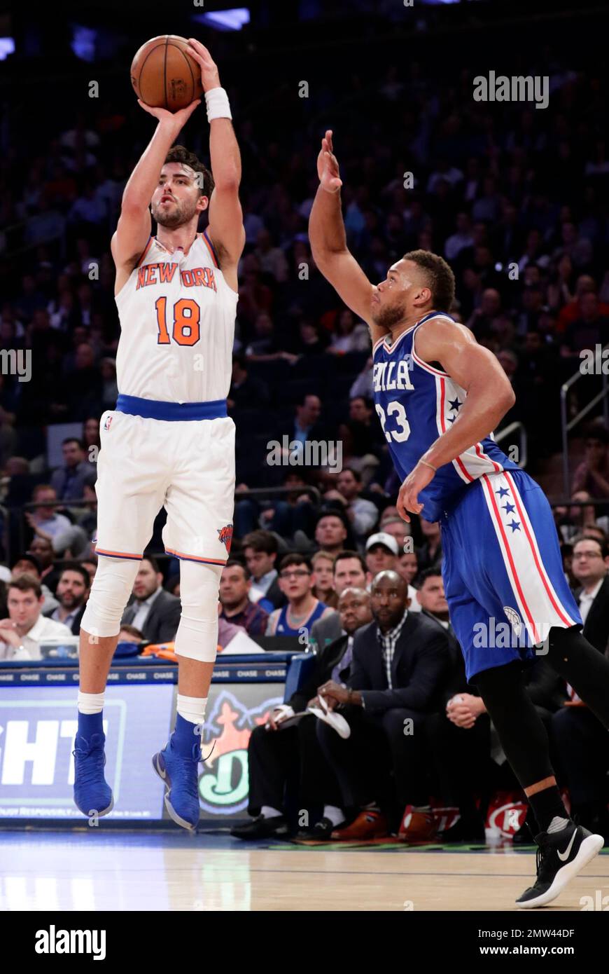 New York Knicks' Sasha Vujacic (18) shoots over Philadelphia 76ers ...