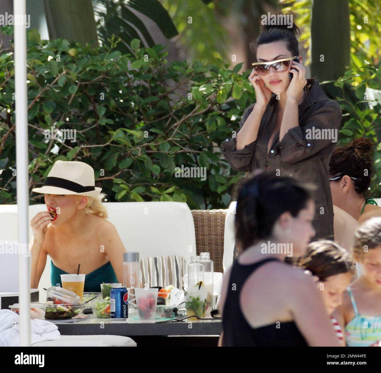 Christina Aguilera joins good pal Simone Harouche poolside at the ...