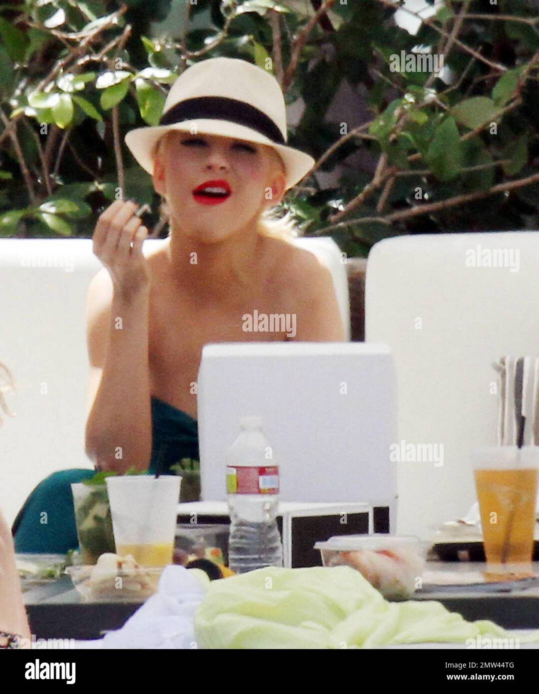 Christina Aguilera joins good pal Simone Harouche poolside at the ...