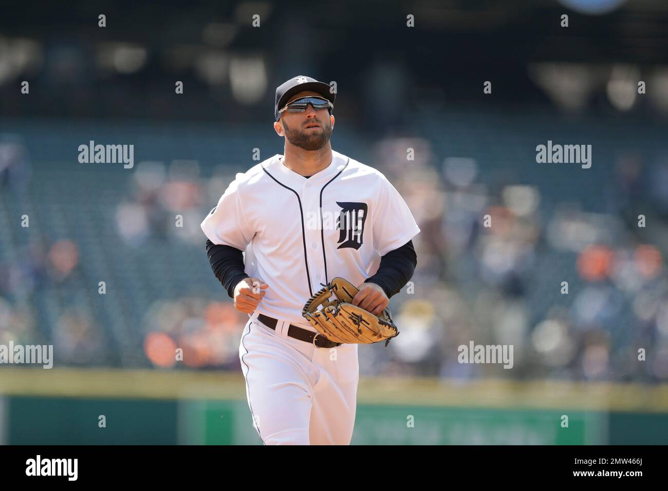 Detroit Tigers right fielder Tyler Collins runs to the dugout during ...