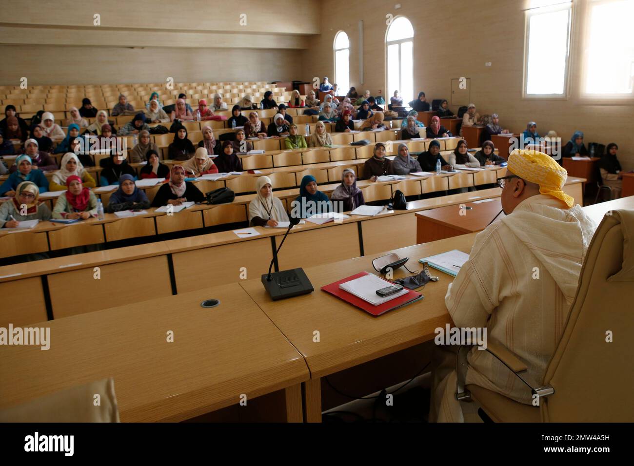 Moroccan women receive their classes as they study religious subjects ...
