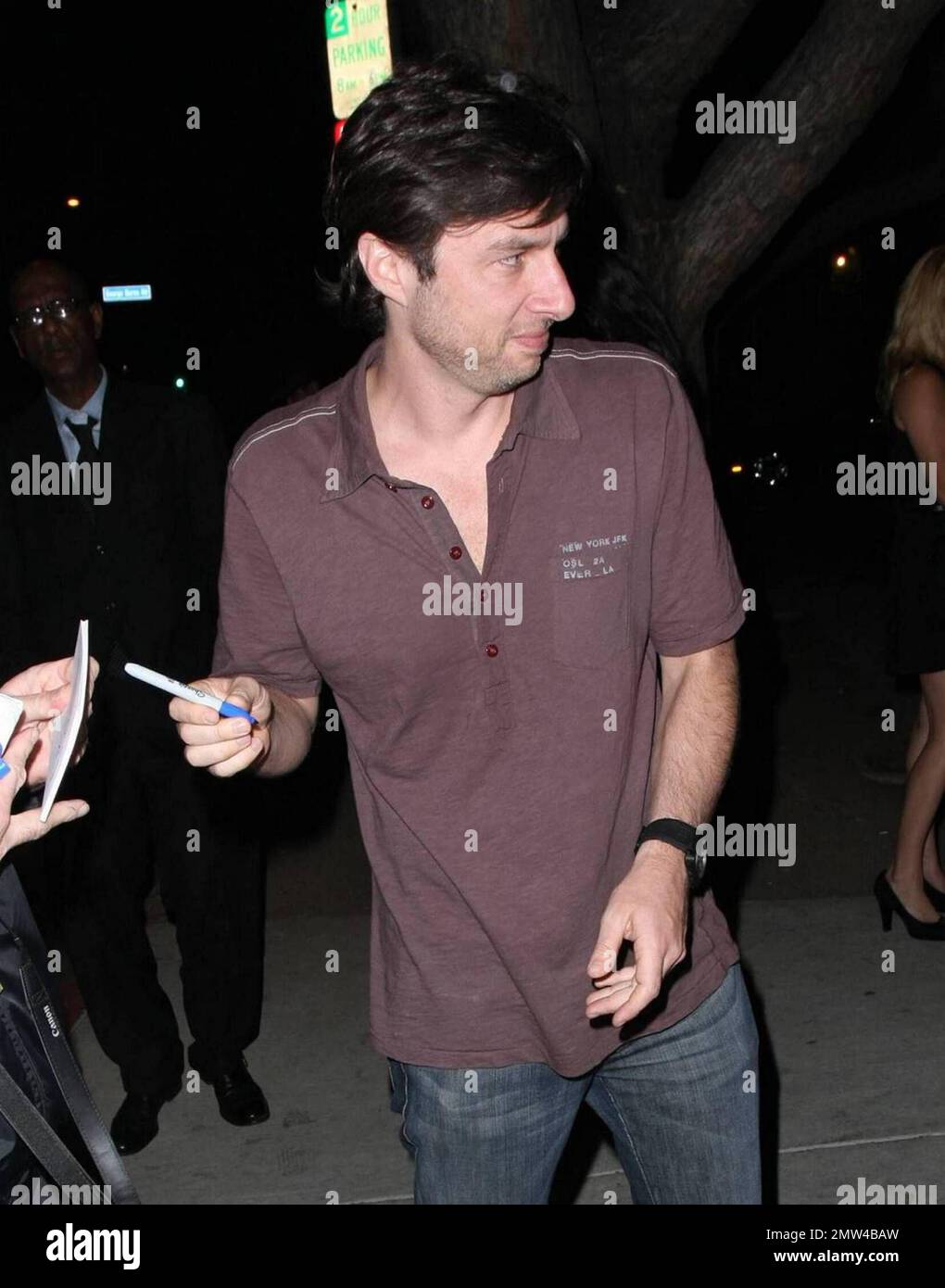 "Scrubs" star Zach Braff signs autographs outside the nightclub Guys ...