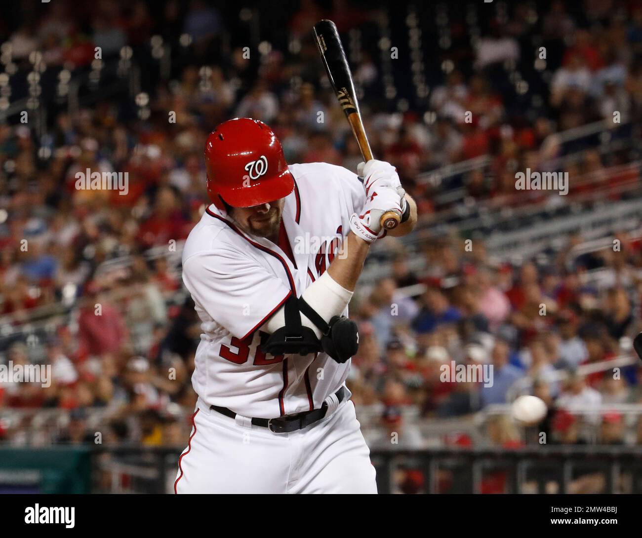 Washington Nationals Matt Wieters (32), looks at the ball after getting ...