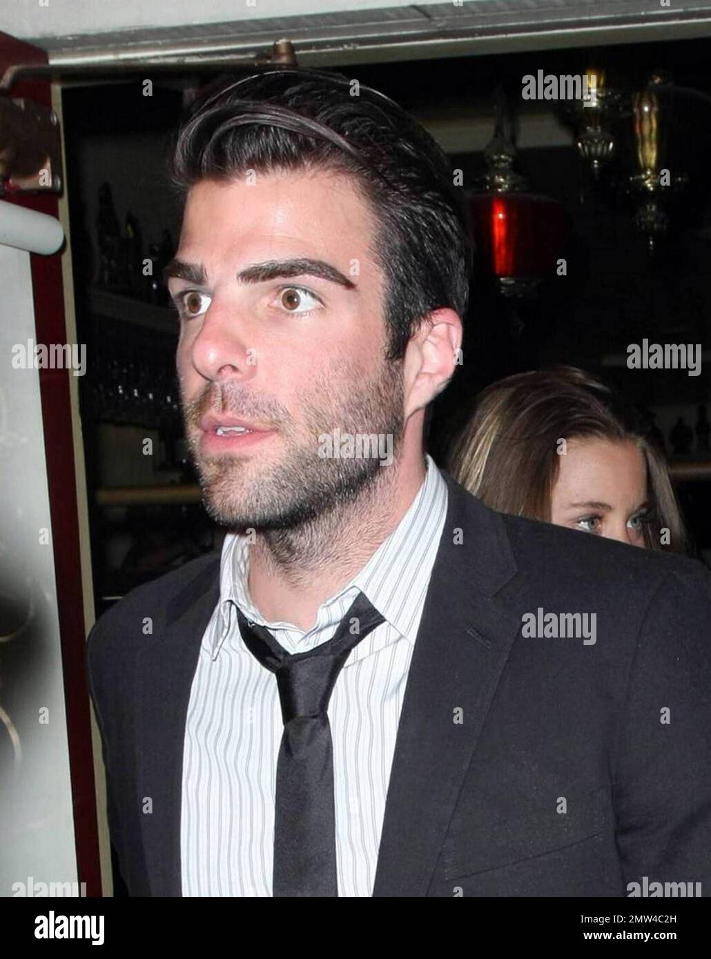 Zachary Quinto leaves the opening party for Signature LA Direct Magazine at Guys and Dolls. Los ...