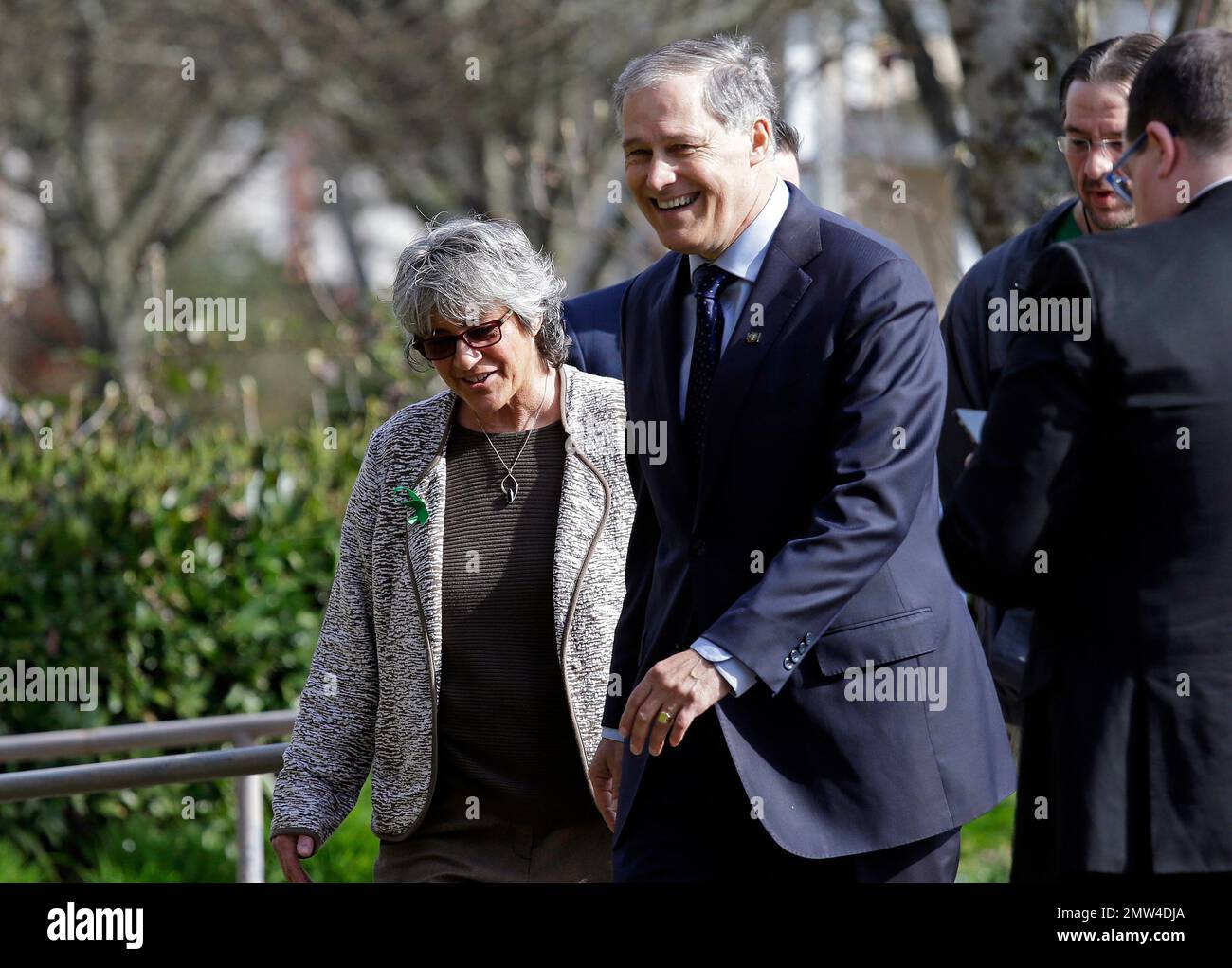 Western State Hospital CEO Cheryl Strange, left, walks with Gov. Jay ...