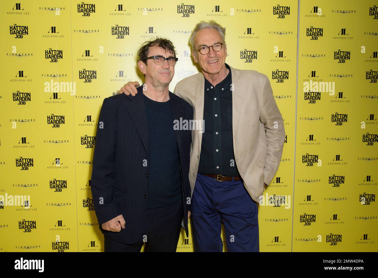 Actors Phil Daniels, left, and Larry Lamb, pose for photographers upon ...
