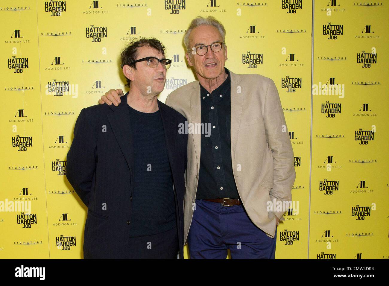 Actors Phil Daniels, left, and Larry Lamb, pose for photographers upon arrival at the premiere ...