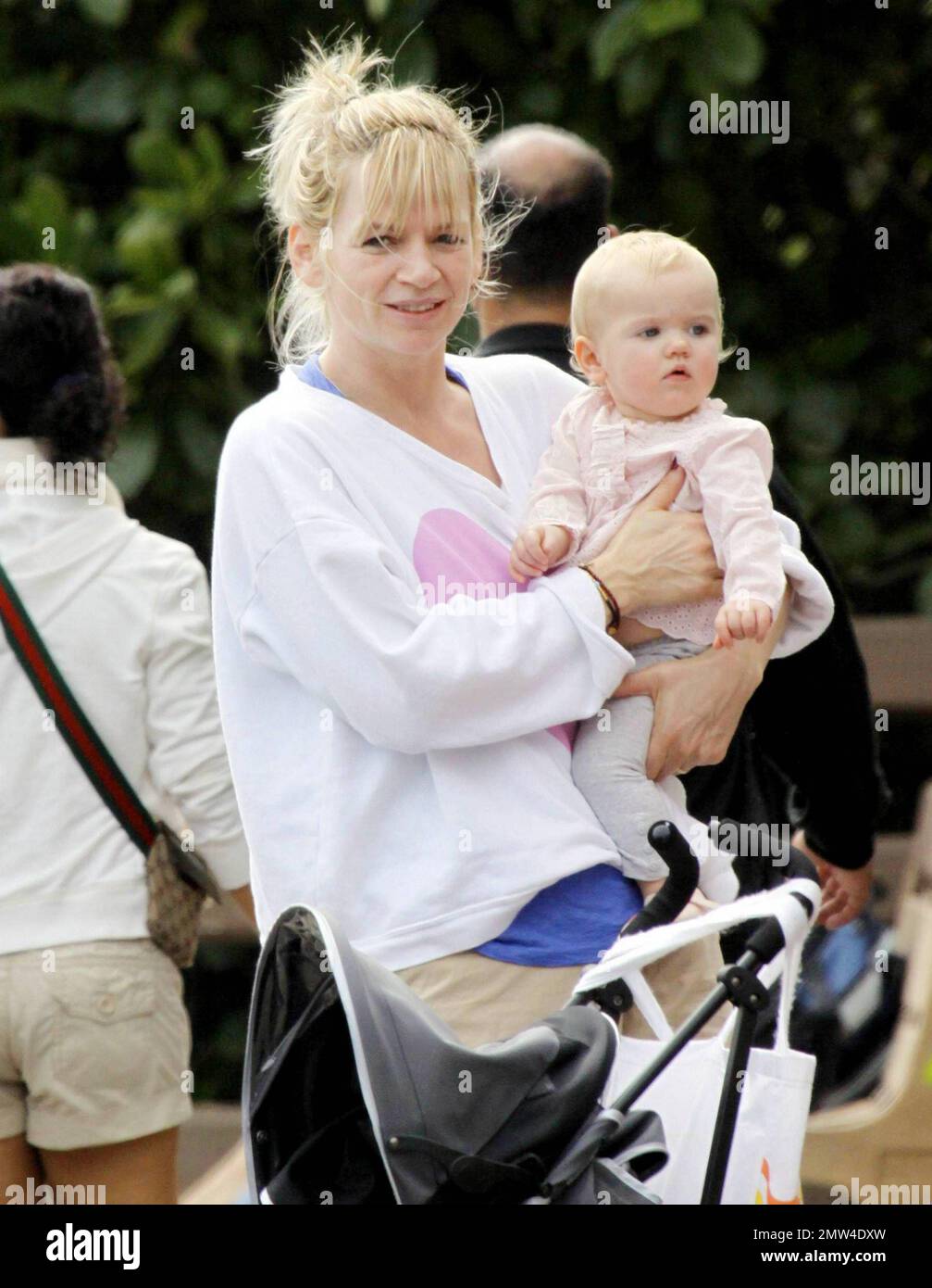 UK television personality Zoe Ball, sans makeup, takes a stroll on the ...