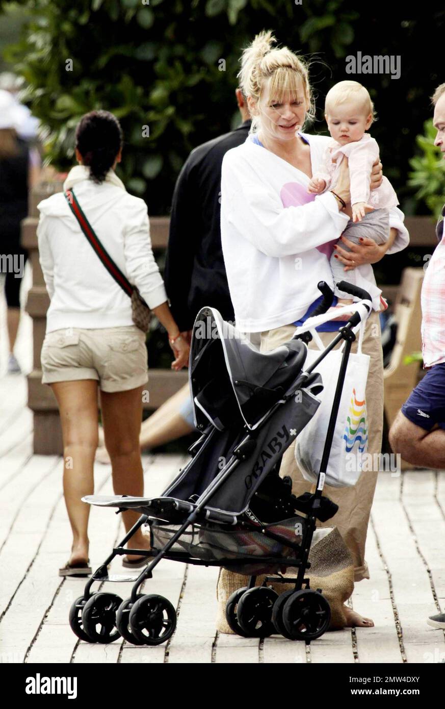 UK television personality Zoe Ball, sans makeup, takes a stroll on the ...