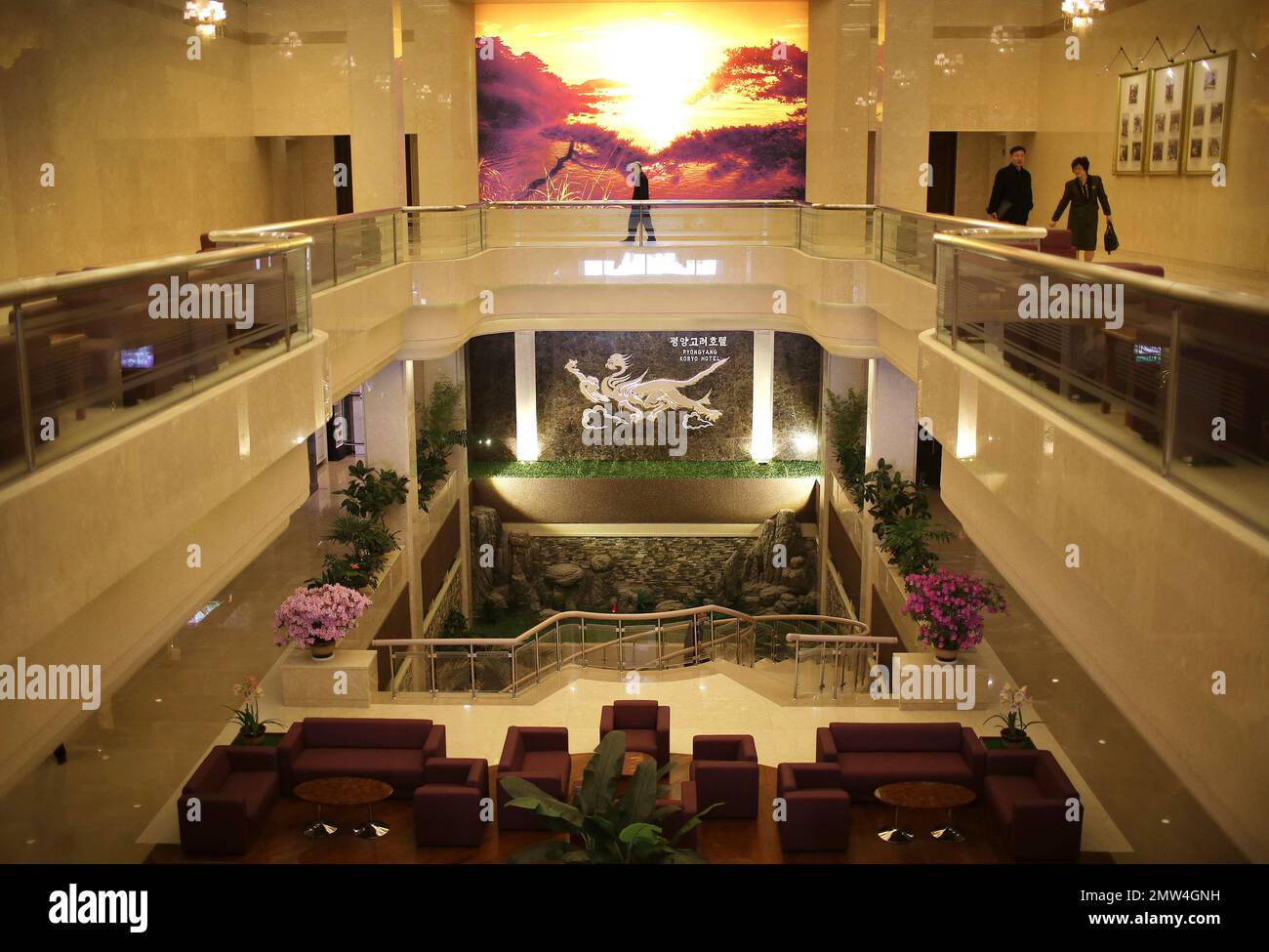 In this Monday, April 10, 2017, photo, people walk on the second floor ...