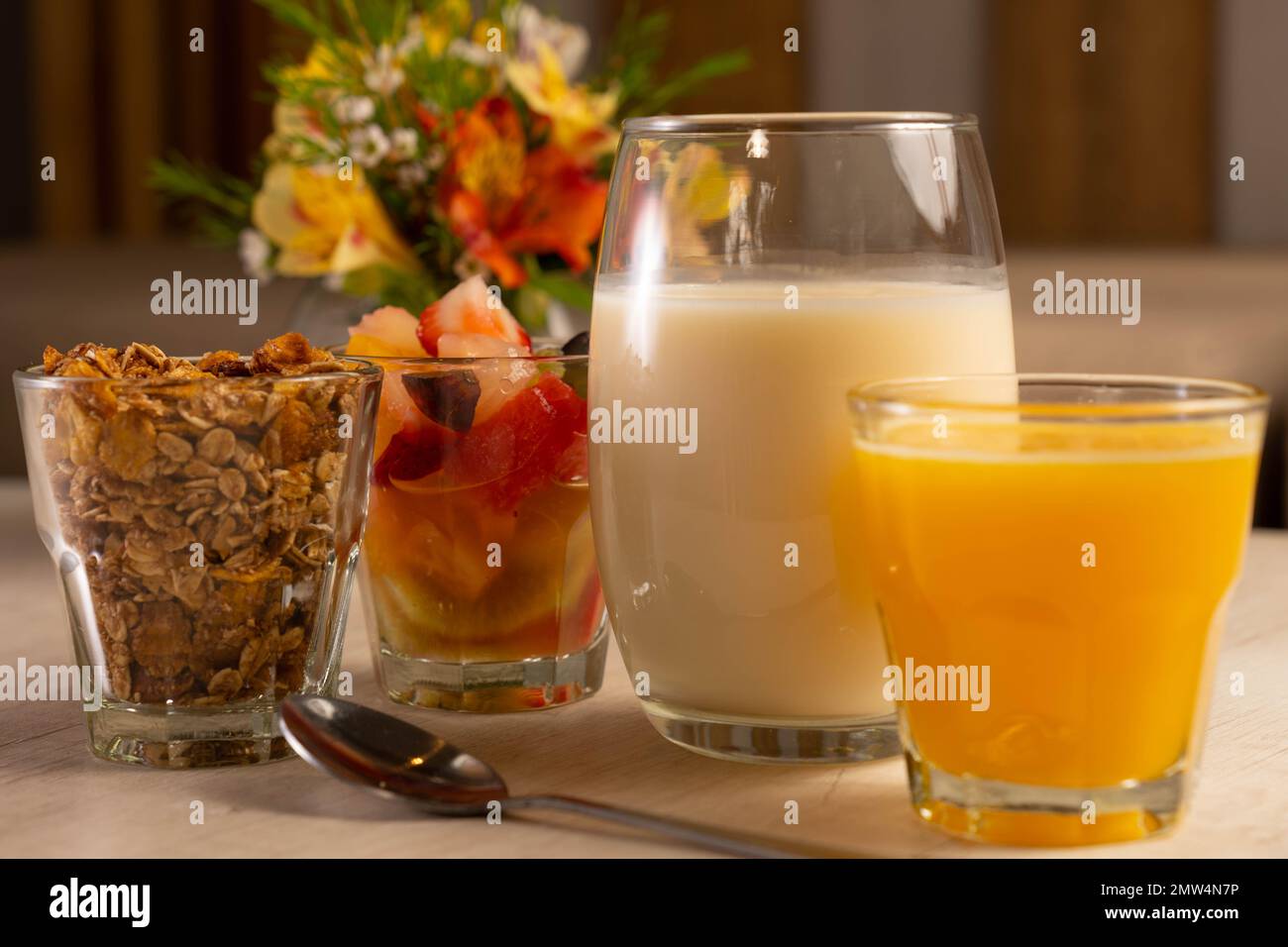 Healthy breakfast with yogurt, granola, fruits and orange juice Stock ...