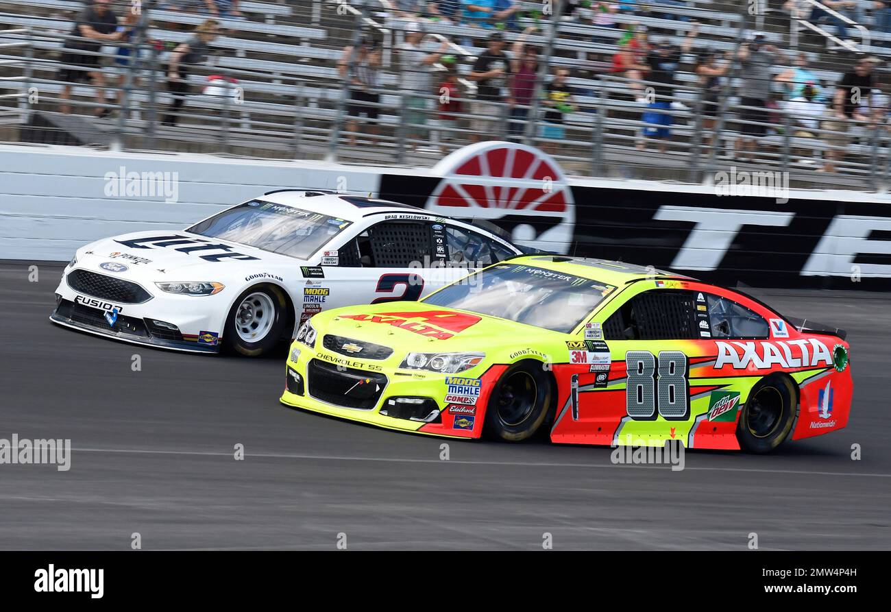Dale Earnhardt Jr. (88) and Brad Keselowski, rear, come out of Turn 4 ...