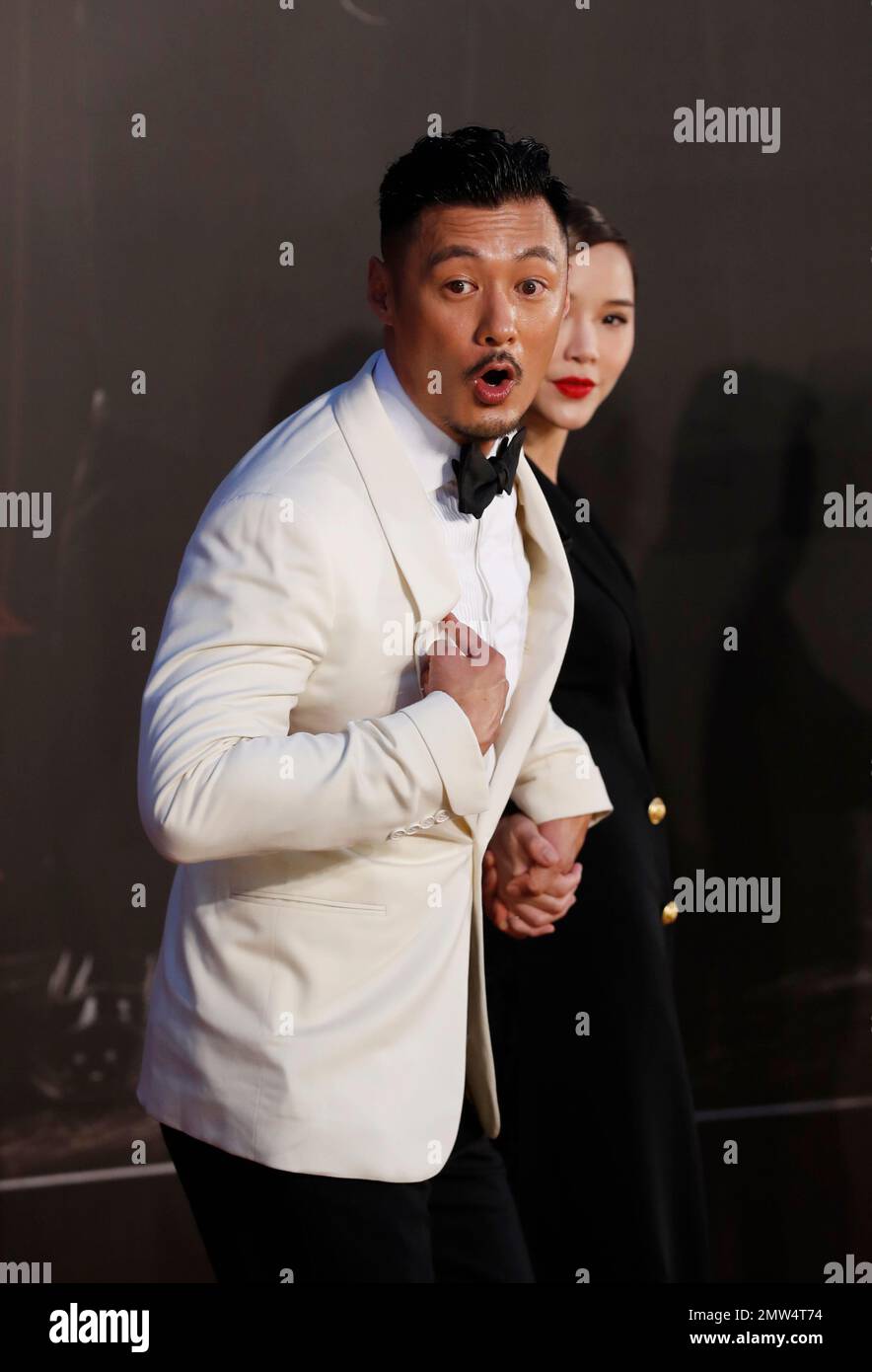 Hong Kong actor Shawn Yue, left, and actress Charmaine Fong pose on the ...